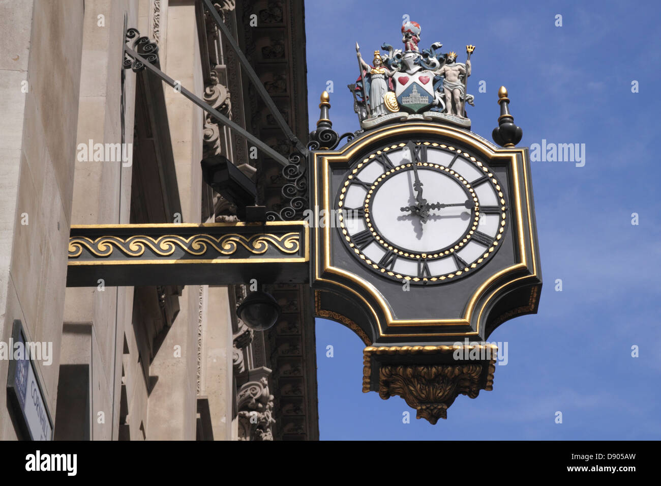Clock on side of Royal Exchange Building London Stock Photo - Alamy