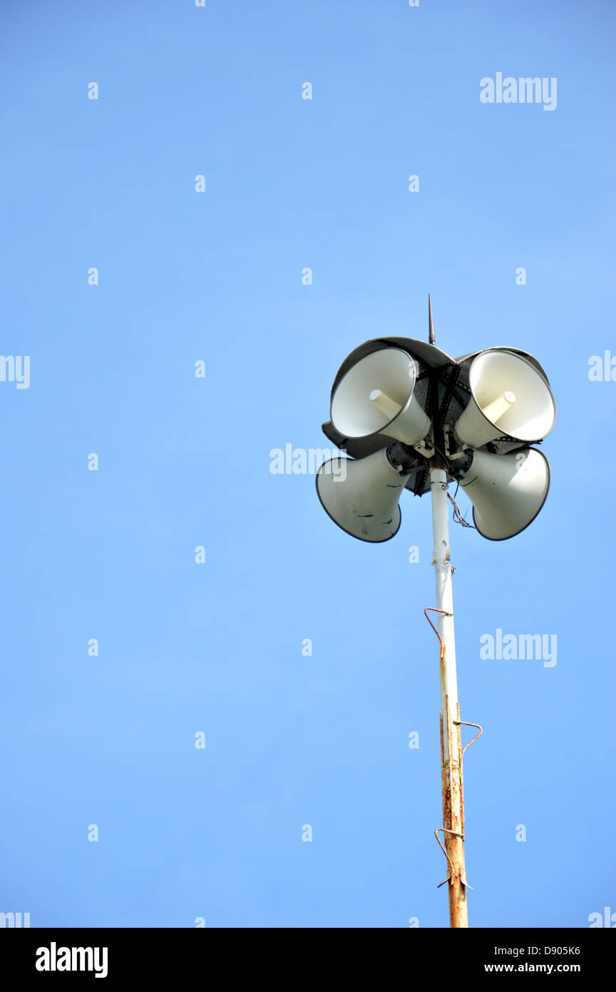 four funnel loudspeakers against blue sky Stock Photo - Alamy