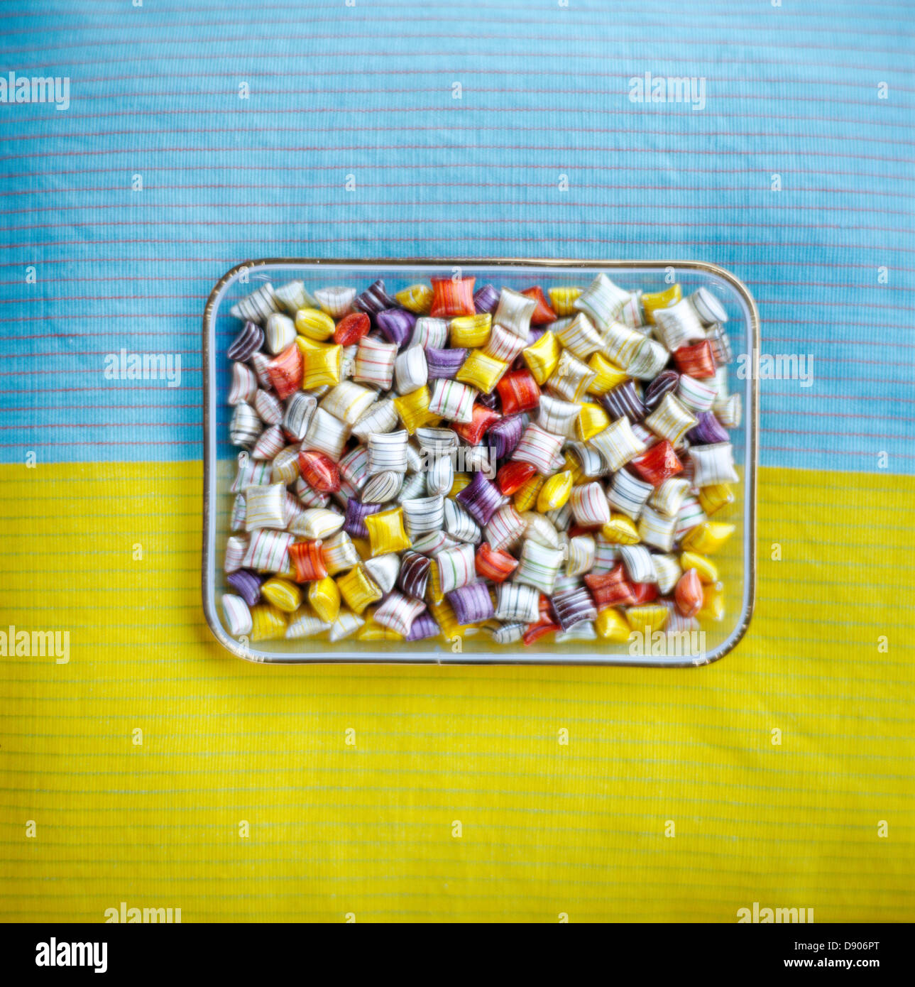 A bowl of sweets against the colours of the swedish flag Stock Photo ...