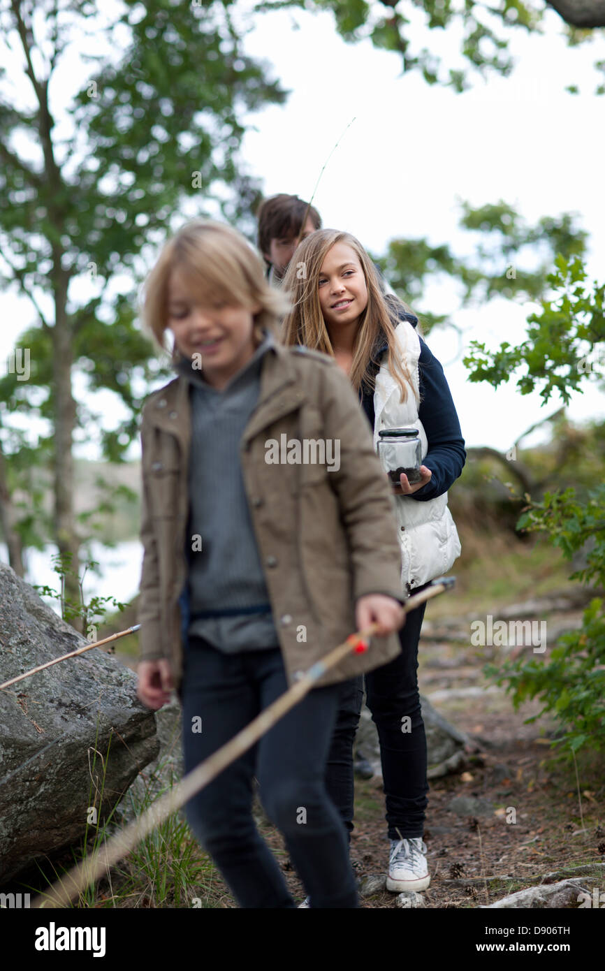 Man walking two boys hi-res stock photography and images - Alamy