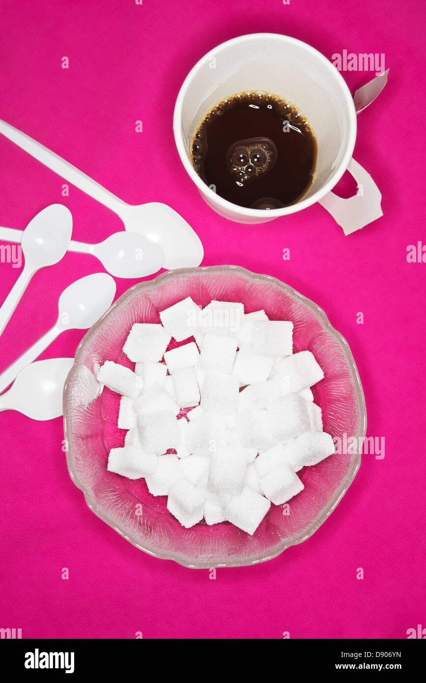 Sugar cubes and coffee cup, studio shot Stock Photo - Alamy