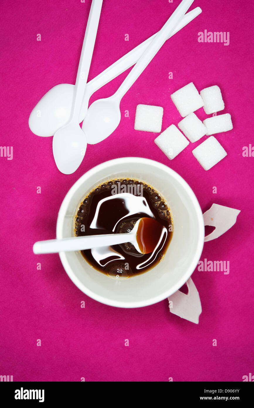 Sugar cubes and coffee cup, studio shot Stock Photo - Alamy
