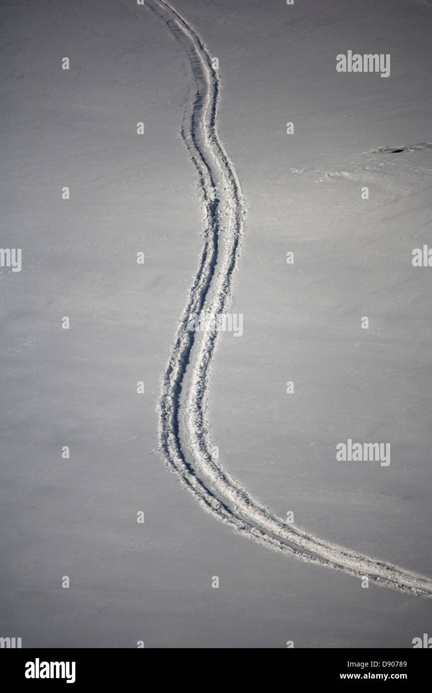 Skiing tracks in snow Stock Photo - Alamy