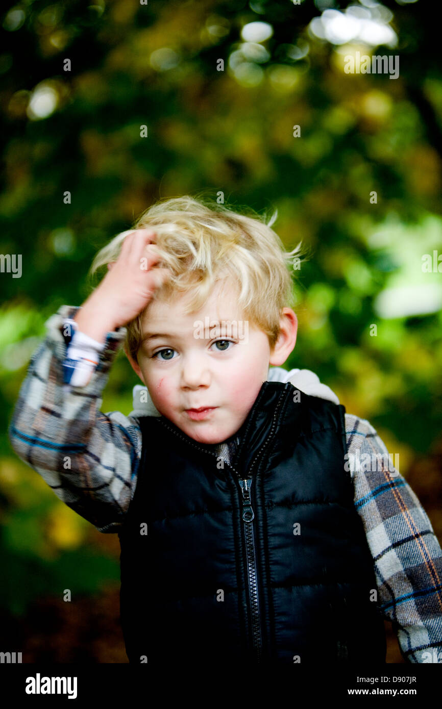 Portrait of a confused boy Stock Photo - Alamy