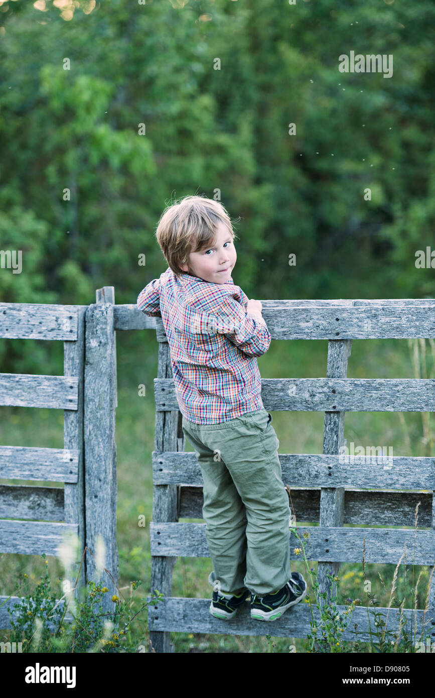 Hanging On To Fence High Resolution Stock Photography and Images - Alamy