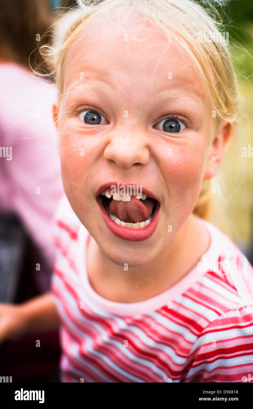 A blond girl making a face Stock Photo - Alamy