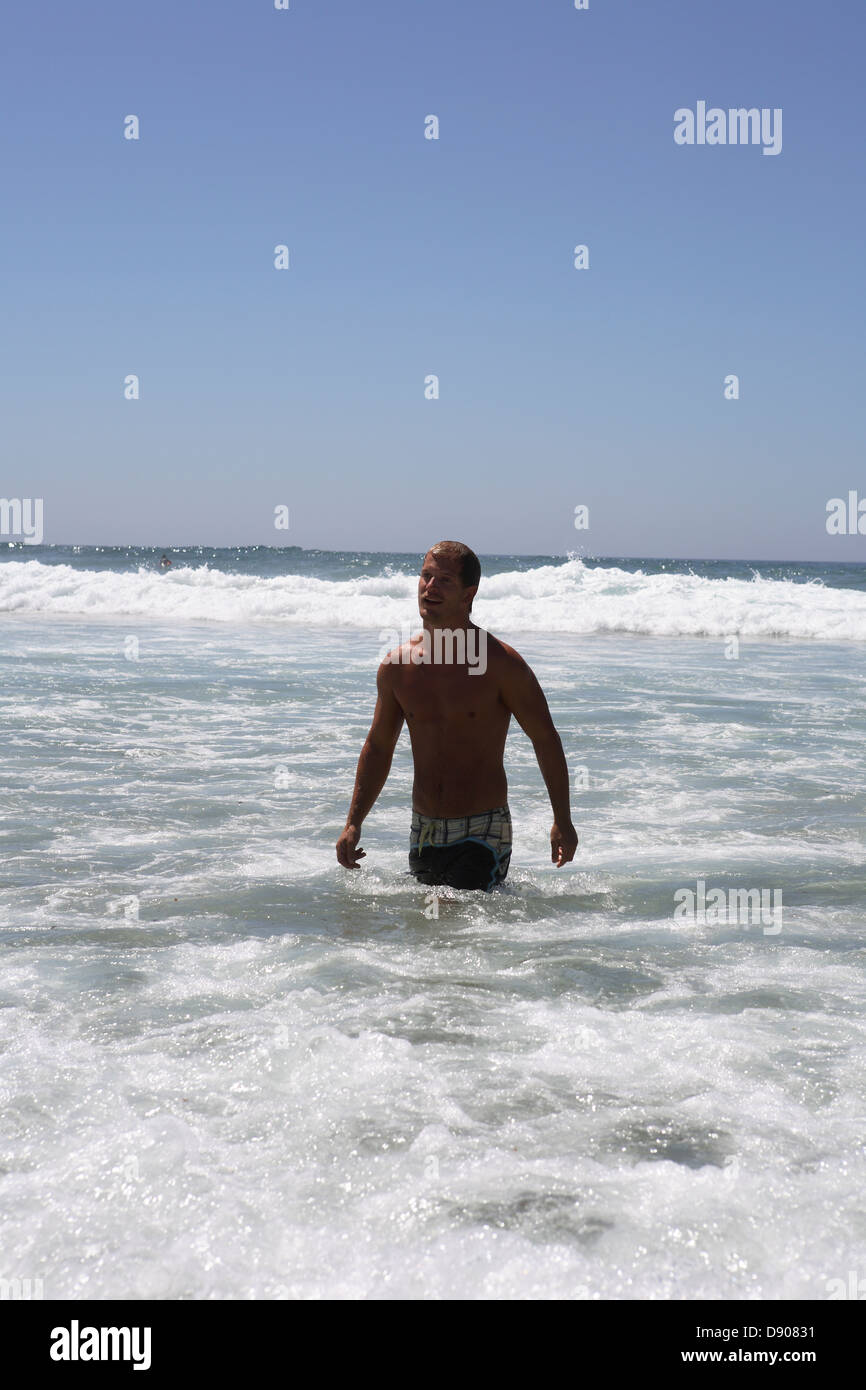 A man bathing in the sea Stock Photo - Alamy