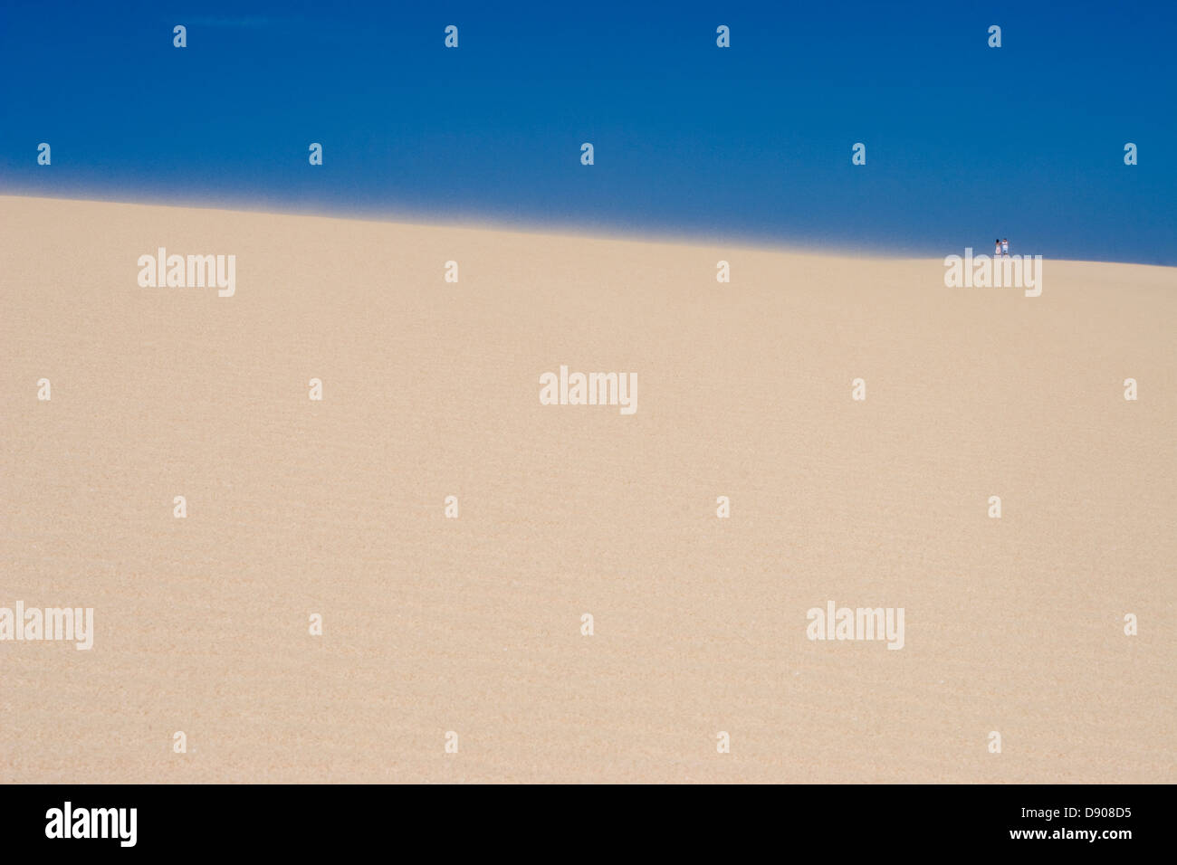 Sand and blue sky Stock Photo - Alamy