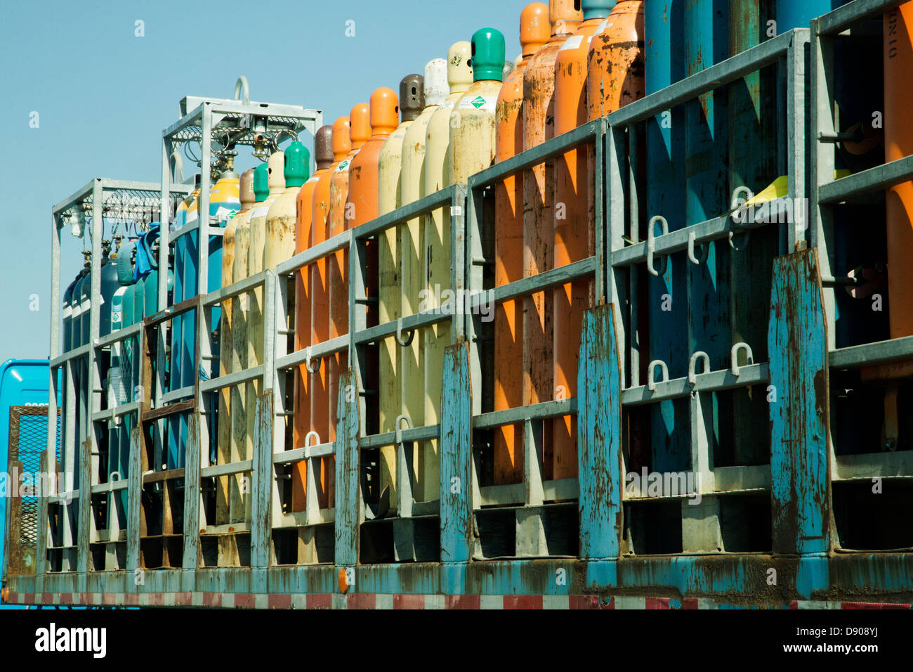 Colorful liquid gas(helium) tanks carried by truck Stock Photo - Alamy