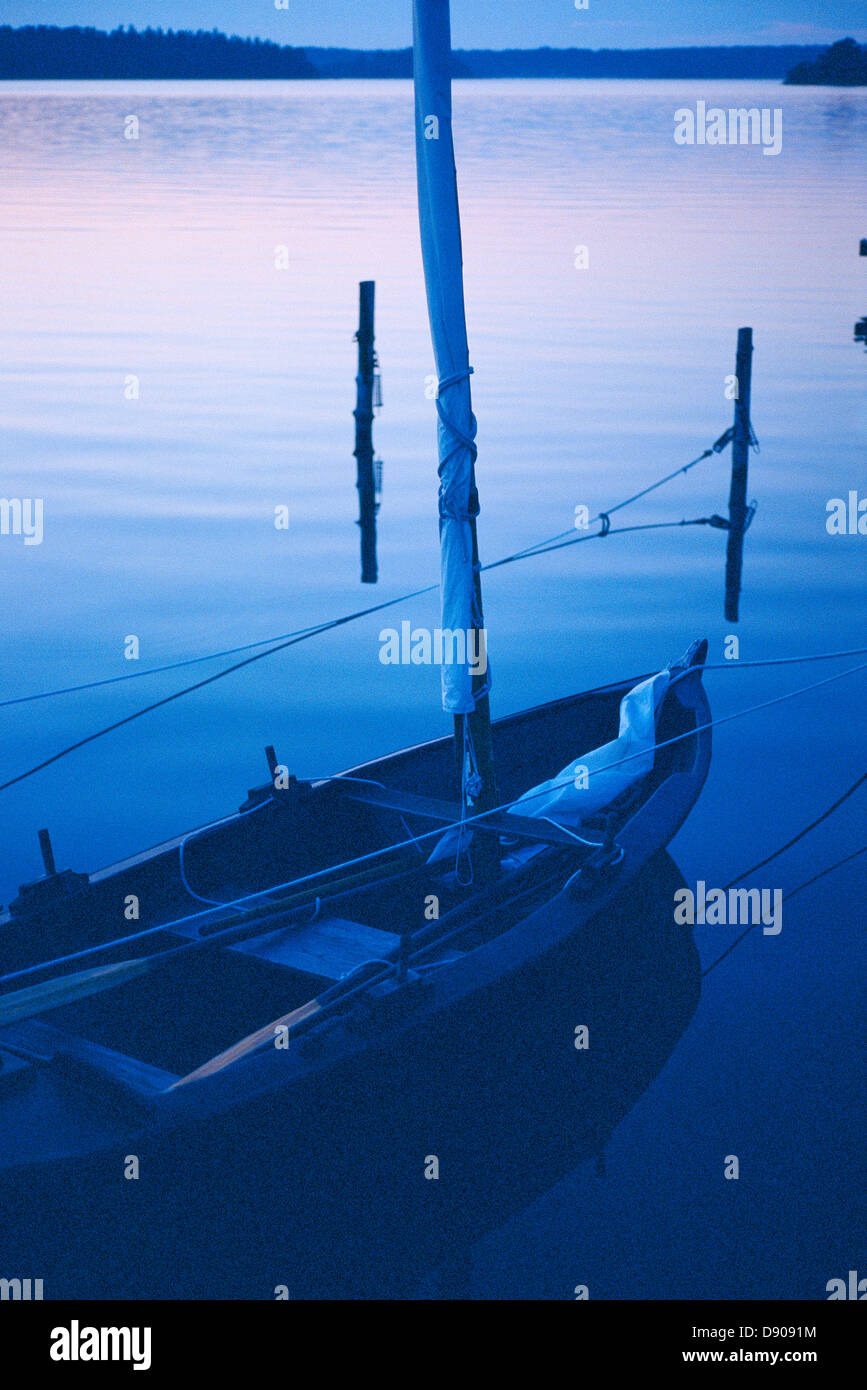 An old fashioned sailingboat in the evening light Stock Photo - Alamy