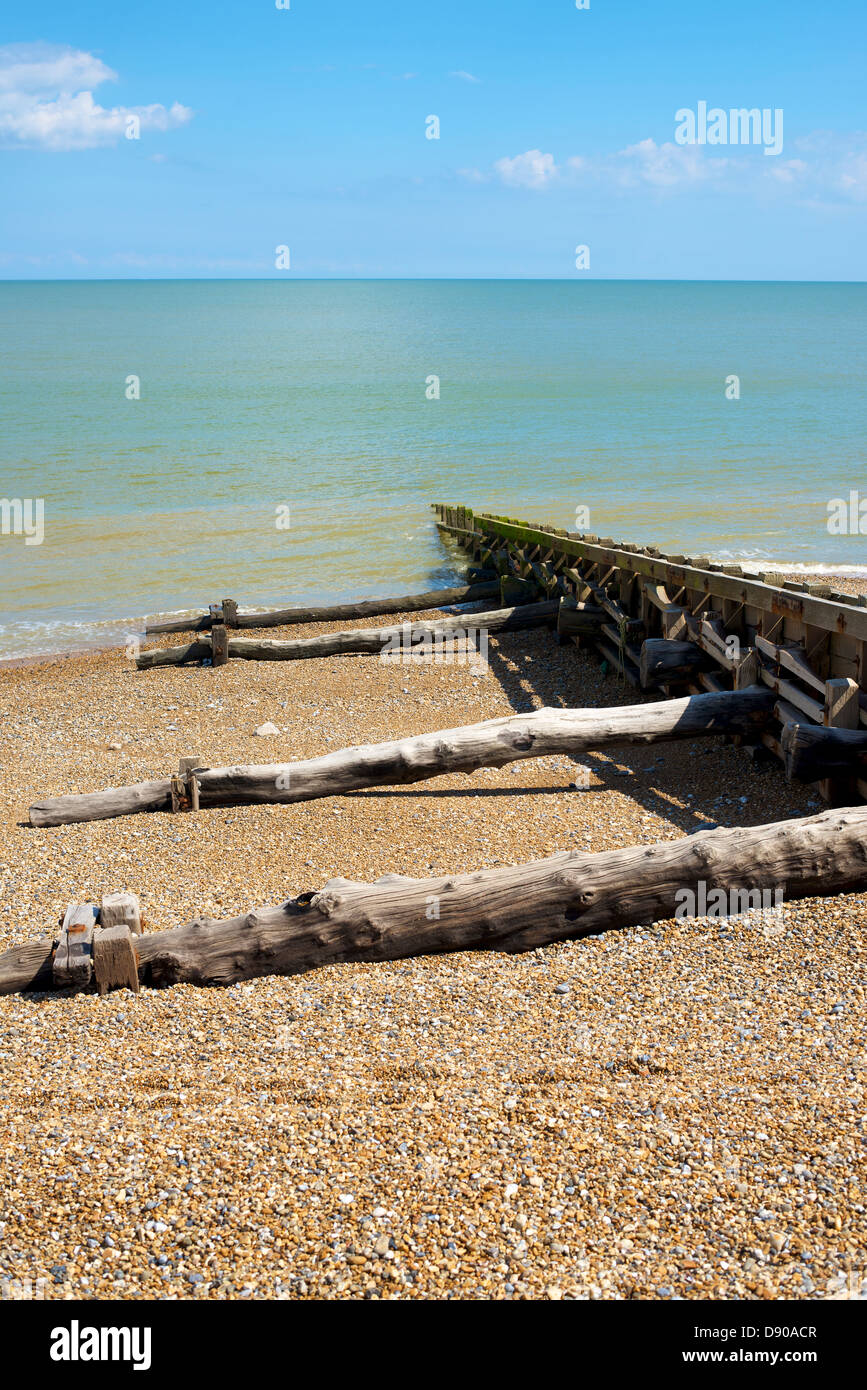Skyline, shingle beach and wooden groyne at Pevensey, East Sussex Stock ...