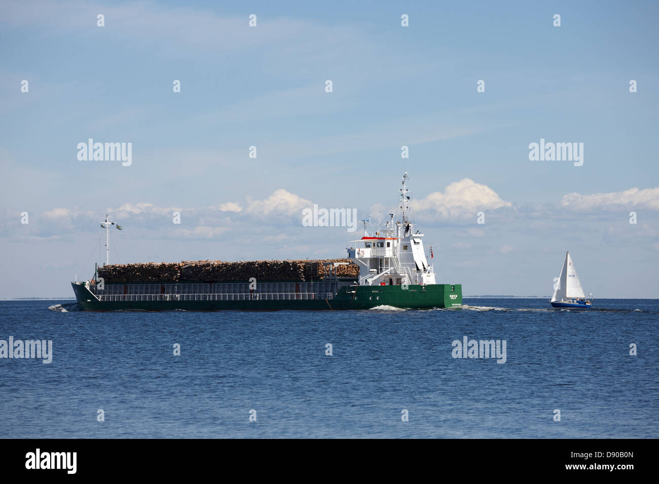 A cargo-ship loaded with timber, Sweden Stock Photo - Alamy