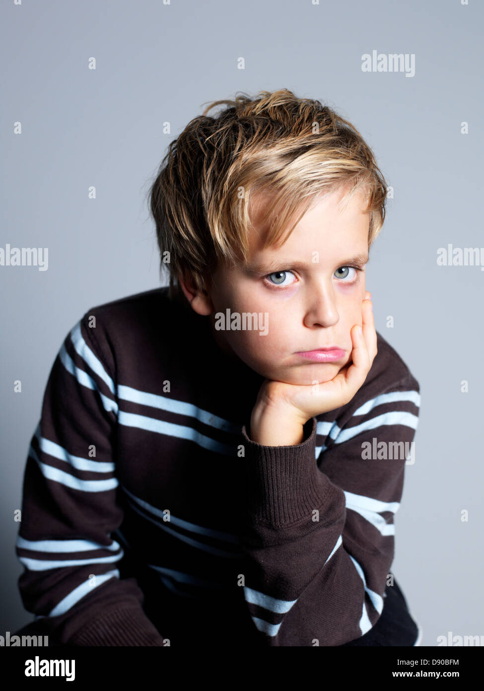Portrait sulking boy hi-res stock photography and images - Alamy