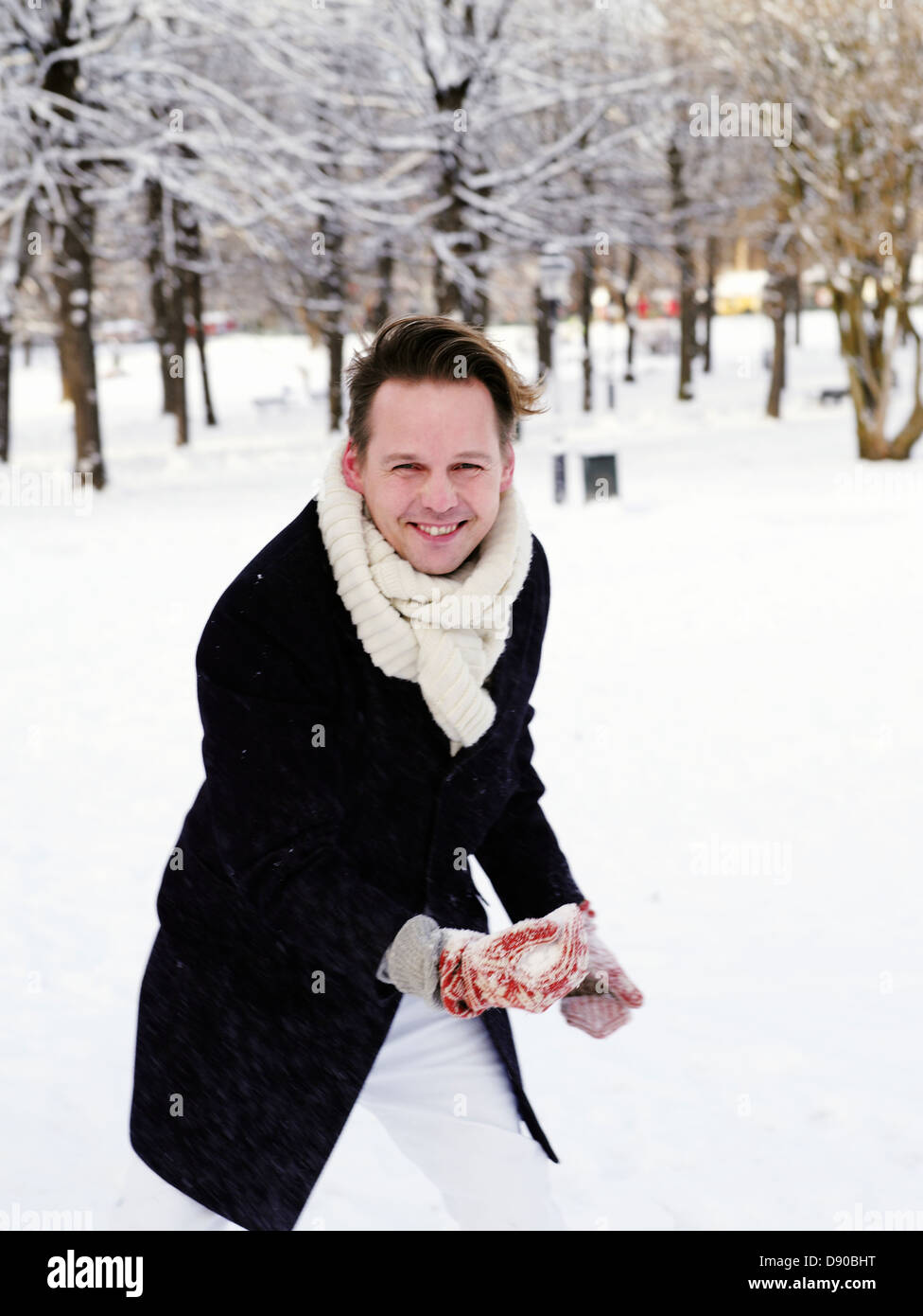 Person holding a snowball hi-res stock photography and images - Alamy