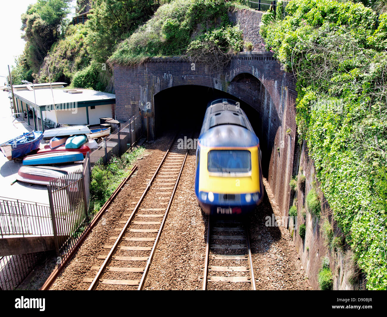 Train coming through tunnel, Dawlish, Devon, UK 2013 Stock Photo - Alamy