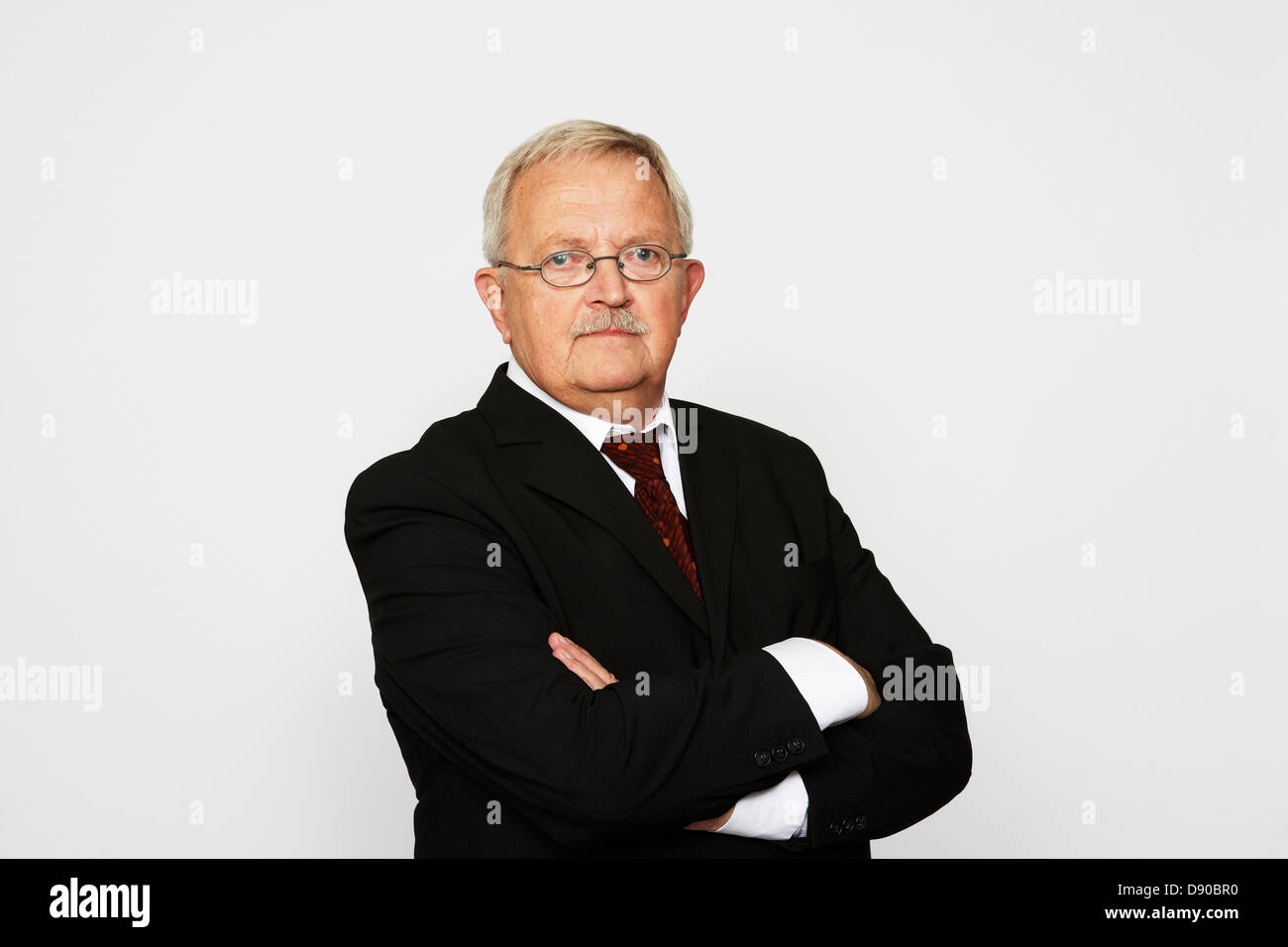 A man with his arms crossed Stock Photo - Alamy
