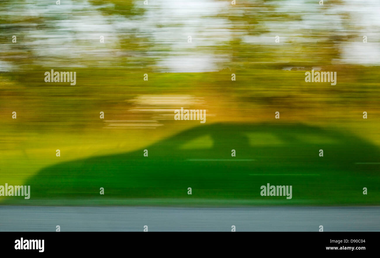 The shadow of a moving car Stock Photo - Alamy