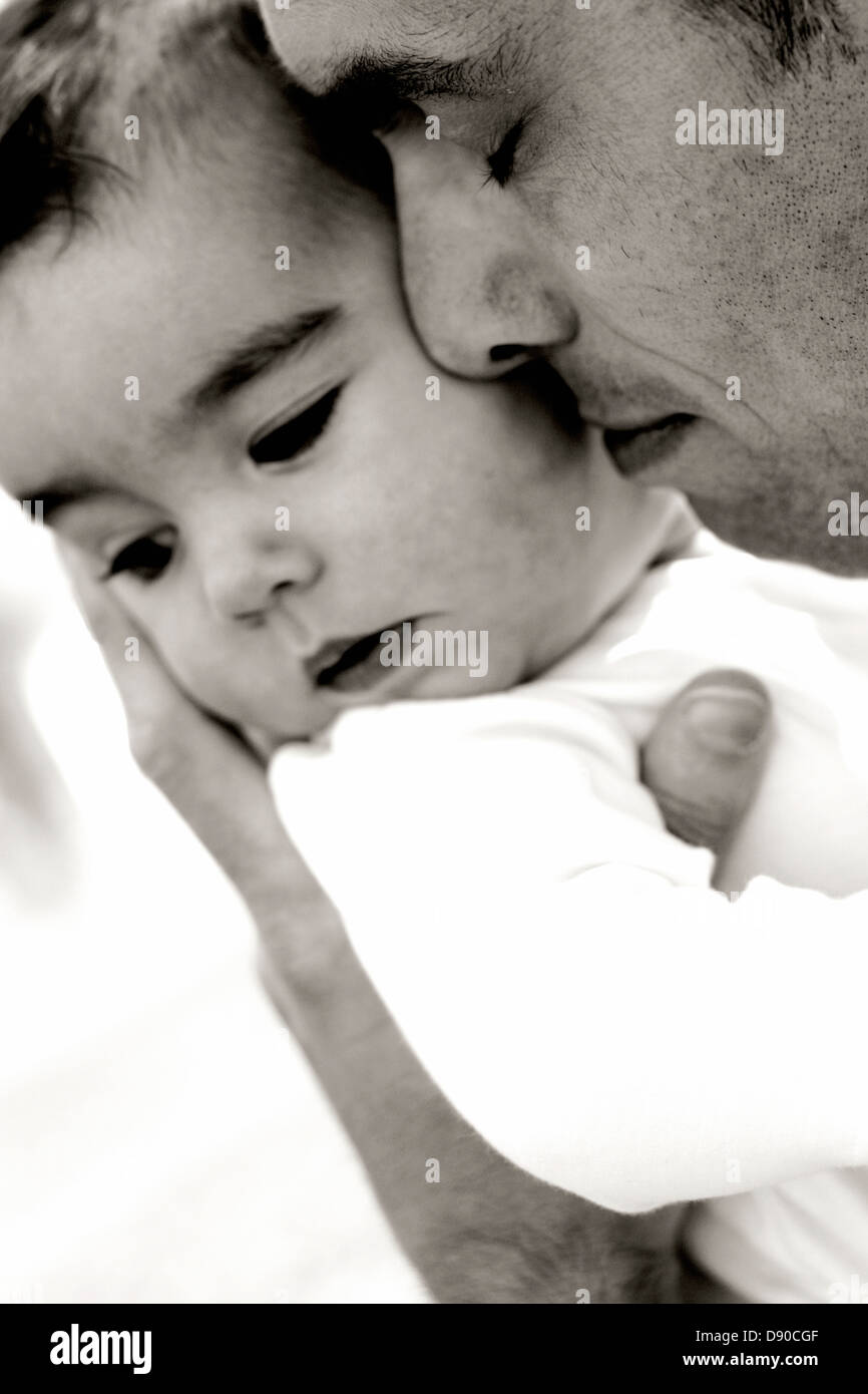 Tender moment with father and child Stock Photo - Alamy