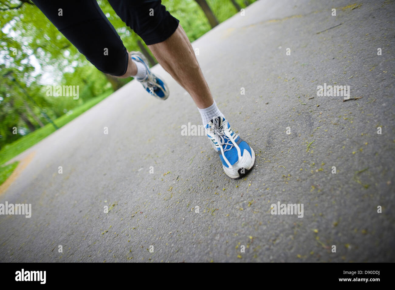 Man jogging in park Stock Photo - Alamy