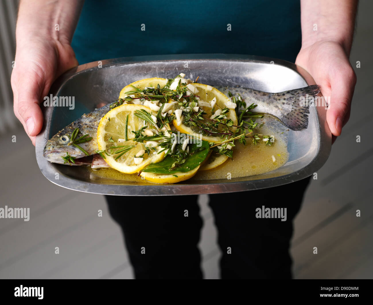 A fish dish with lemon Stock Photo - Alamy