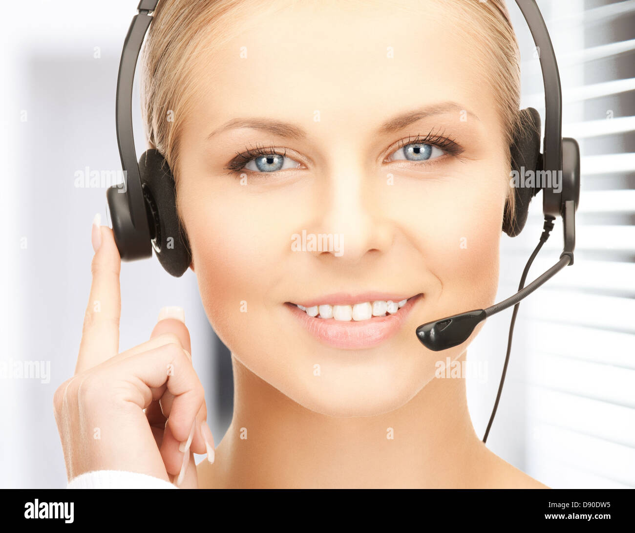 friendly female helpline operator Stock Photo - Alamy