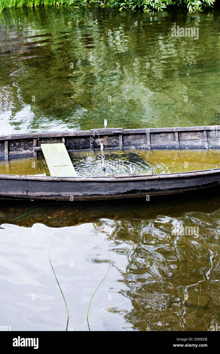 A rowing boat with water, Smaland, Sweden Stock Photo - Alamy