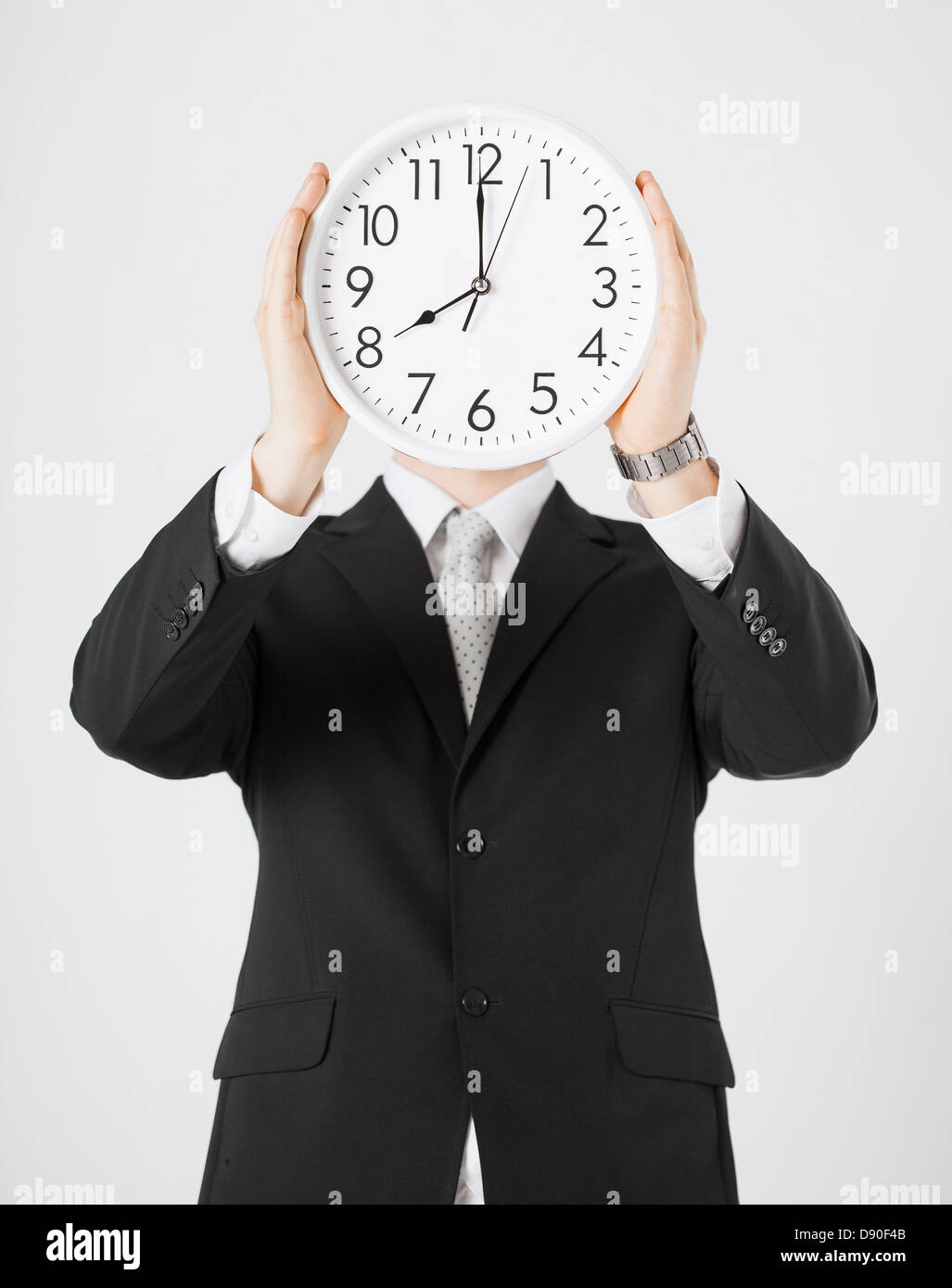 man with wall clock Stock Photo - Alamy