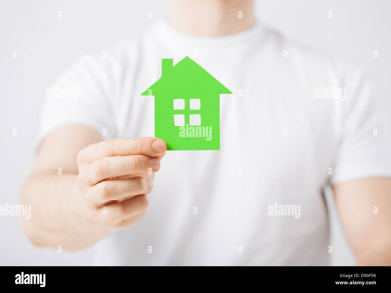 hand holding green house Stock Photo - Alamy