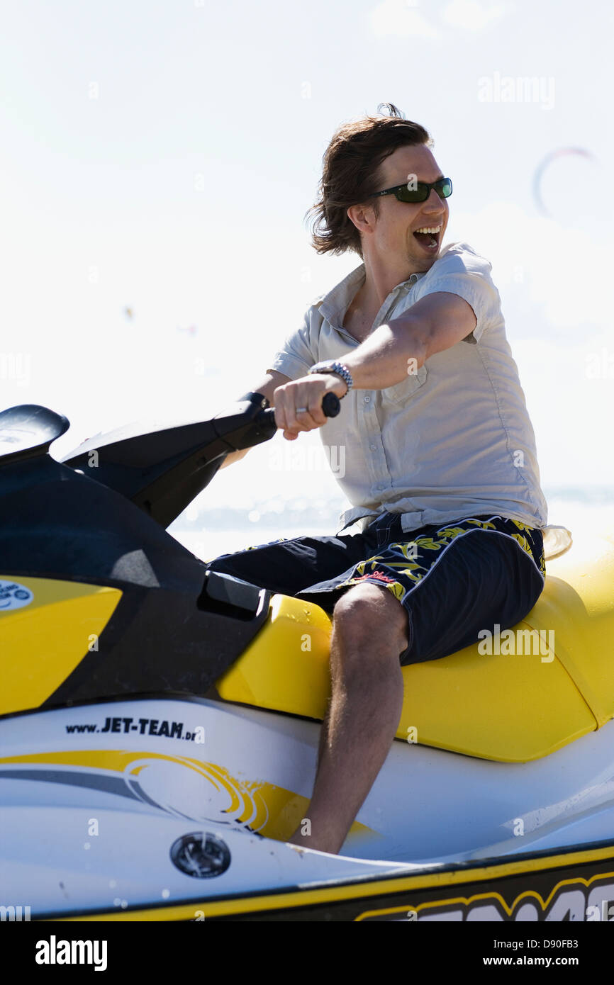 Riding jet ski hi-res stock photography and images - Alamy