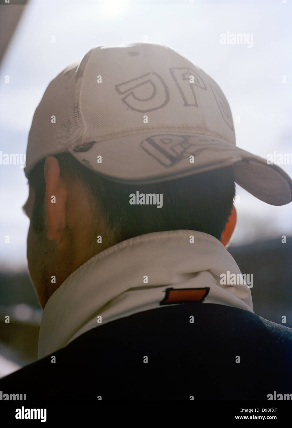 A young man wearing a cap Stock Photo - Alamy