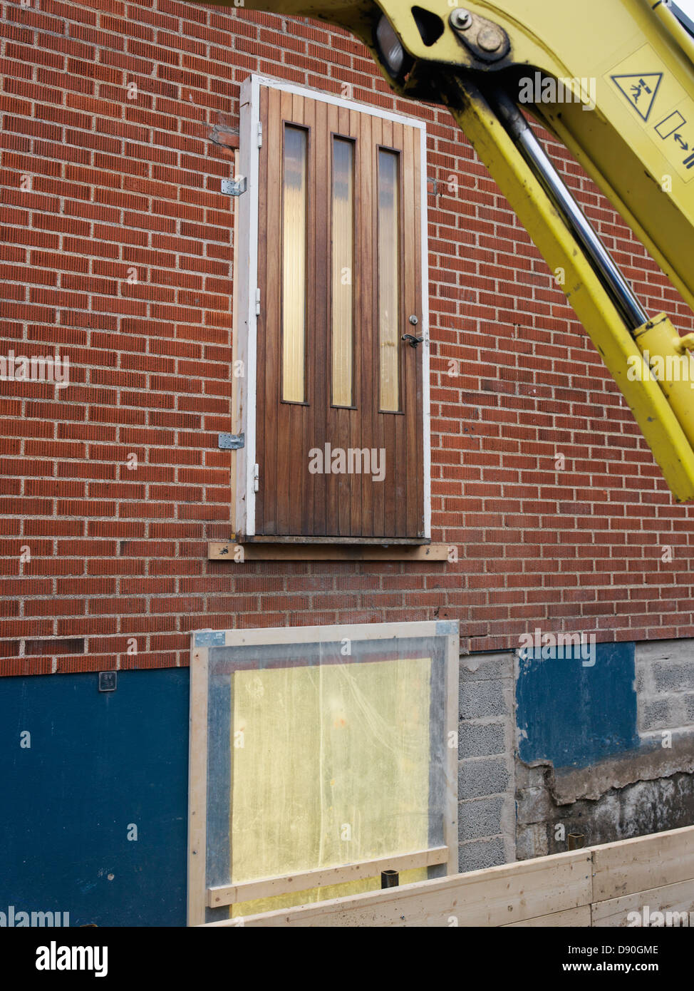 Construction equipment outside house Stock Photo - Alamy