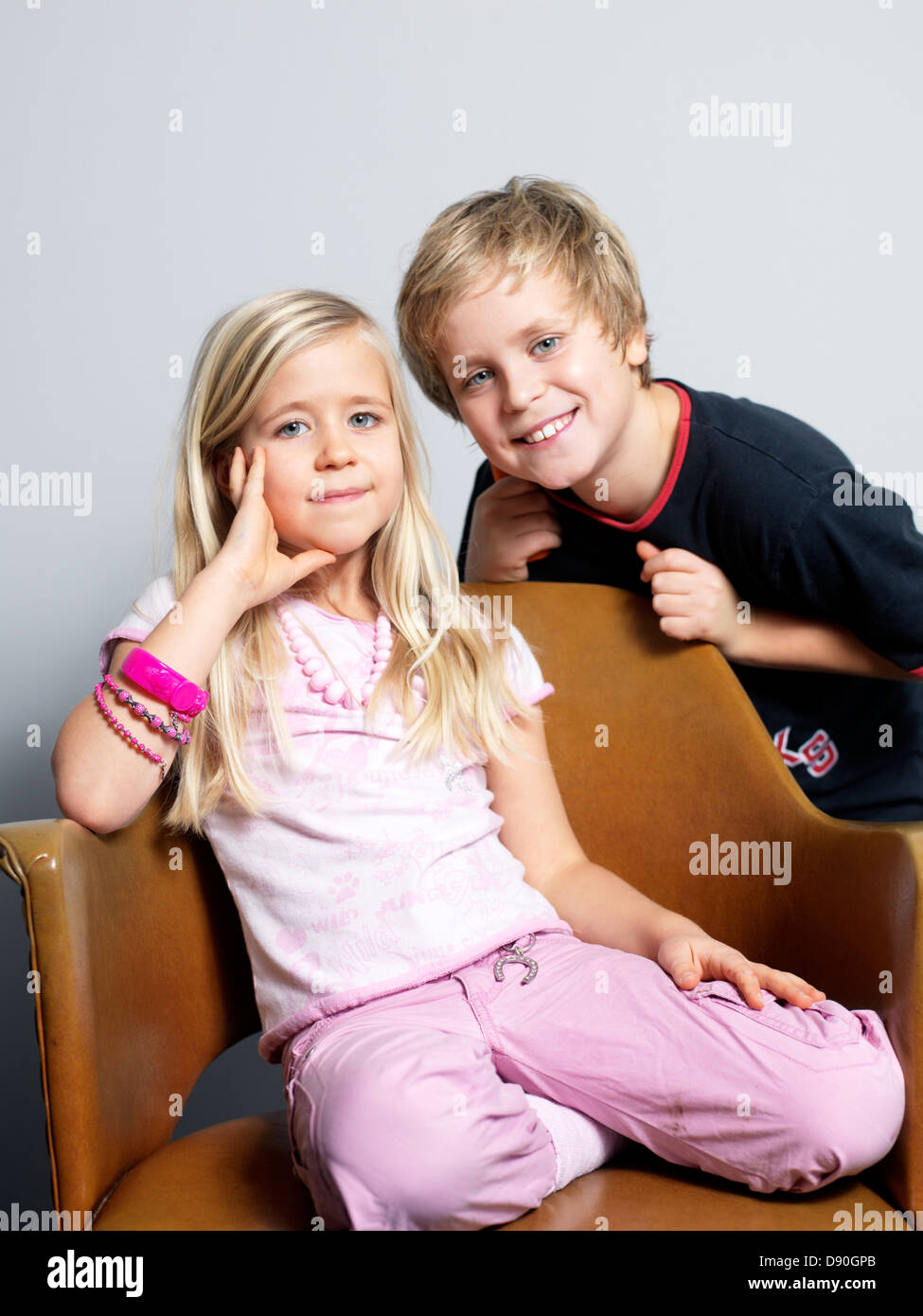 Siblings smiling, portrait Stock Photo - Alamy