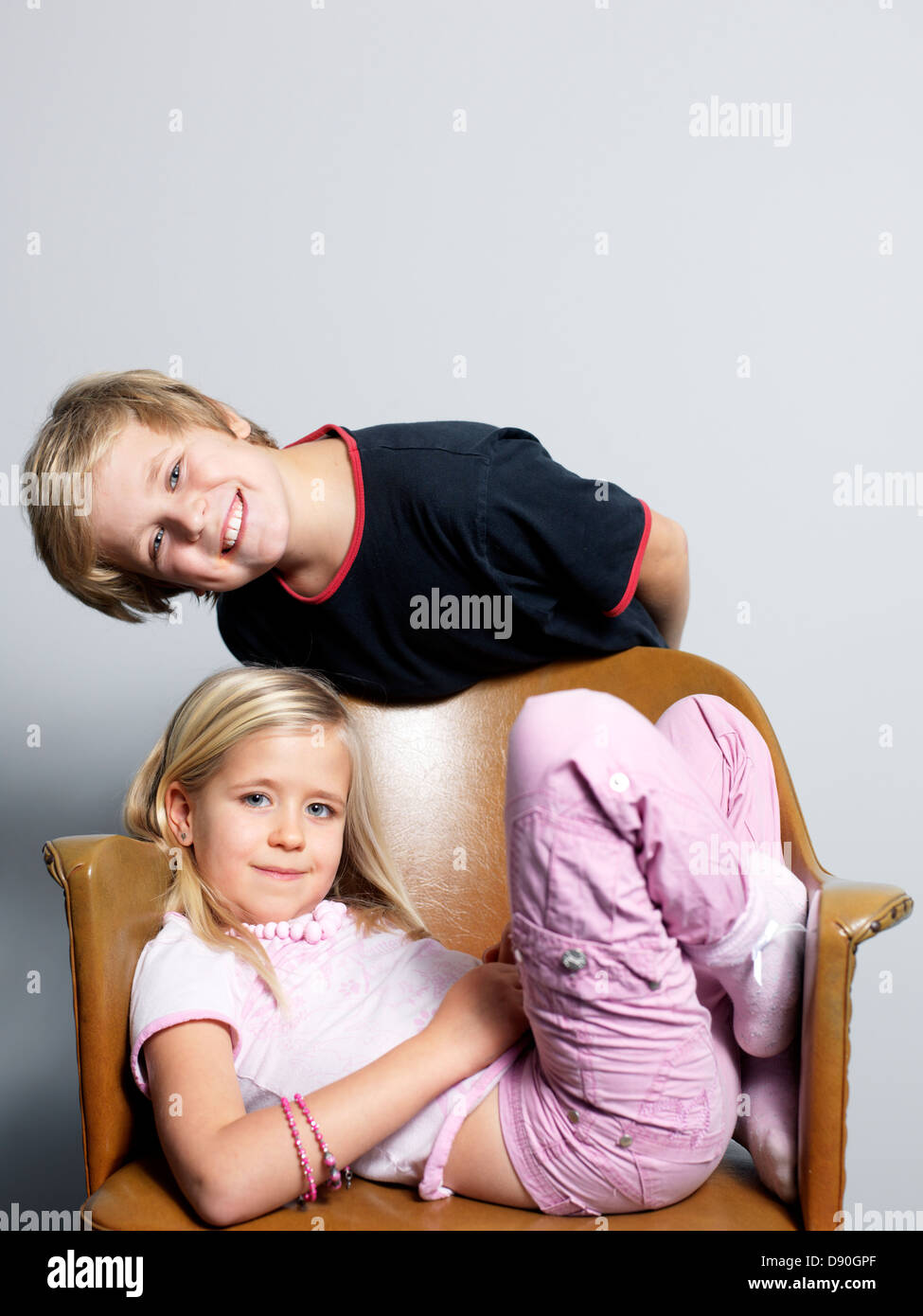 Brother and sister messing about Stock Photo - Alamy