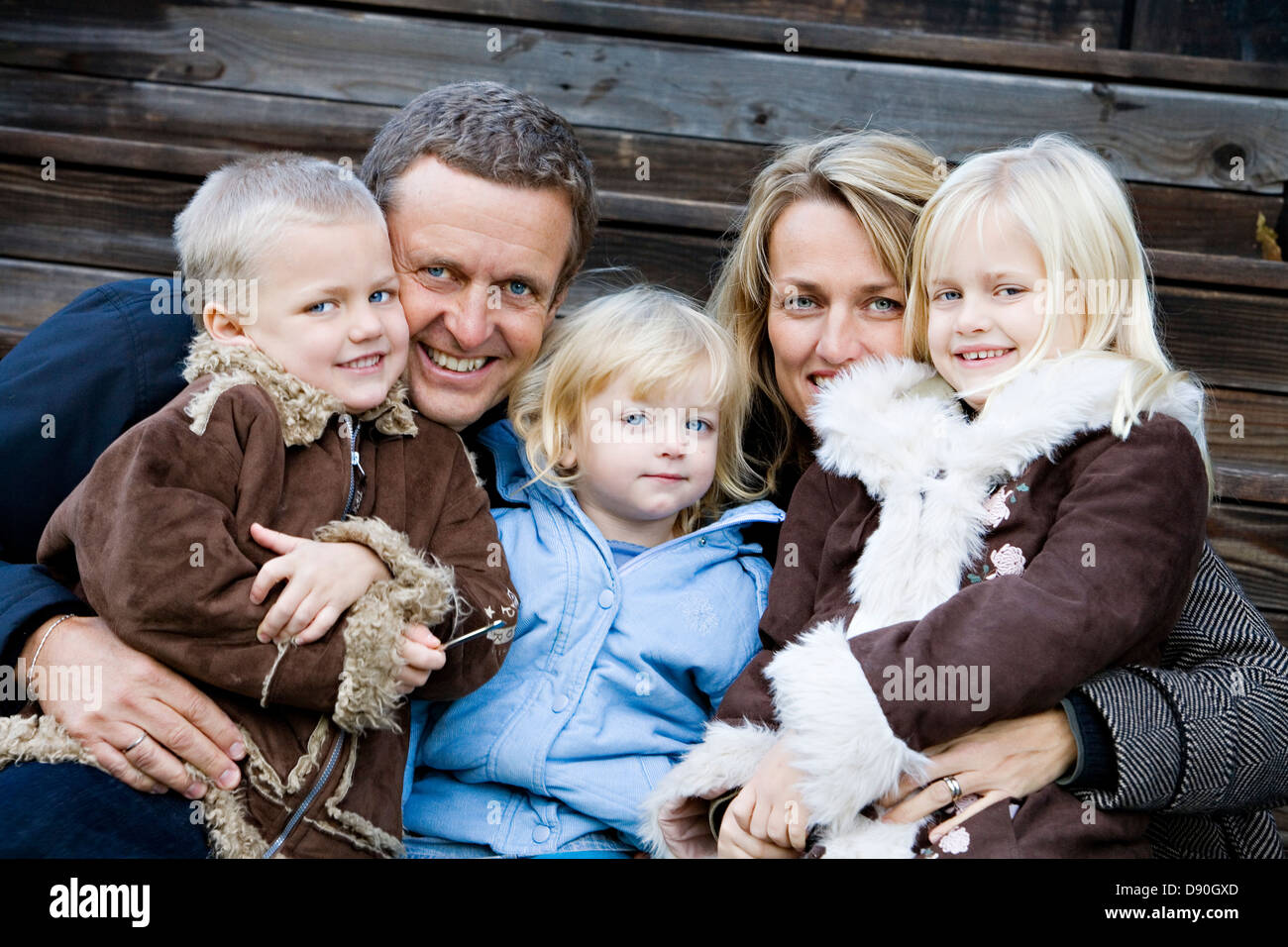 A smiling family with three children, Sweden Stock Photo - Alamy