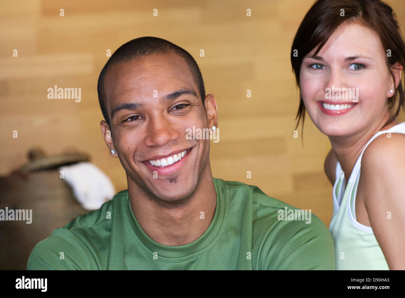 Smiling persons stretching in a gym Stock Photo - Alamy