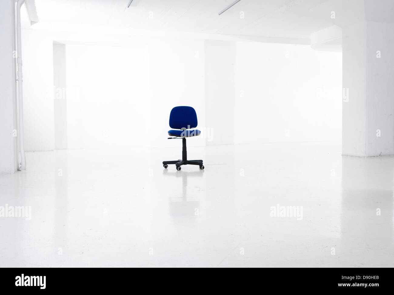 An office chair in an empty office Stock Photo - Alamy