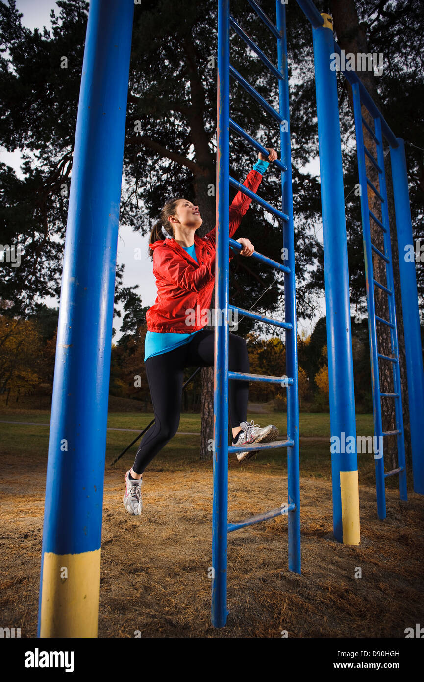 Woman Climbing Ladder at Dorothy Boots blog