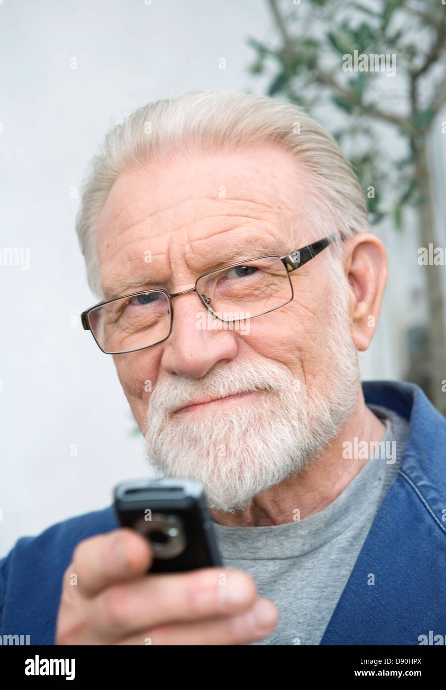 Elderly person using technology hi-res stock photography and images - Alamy