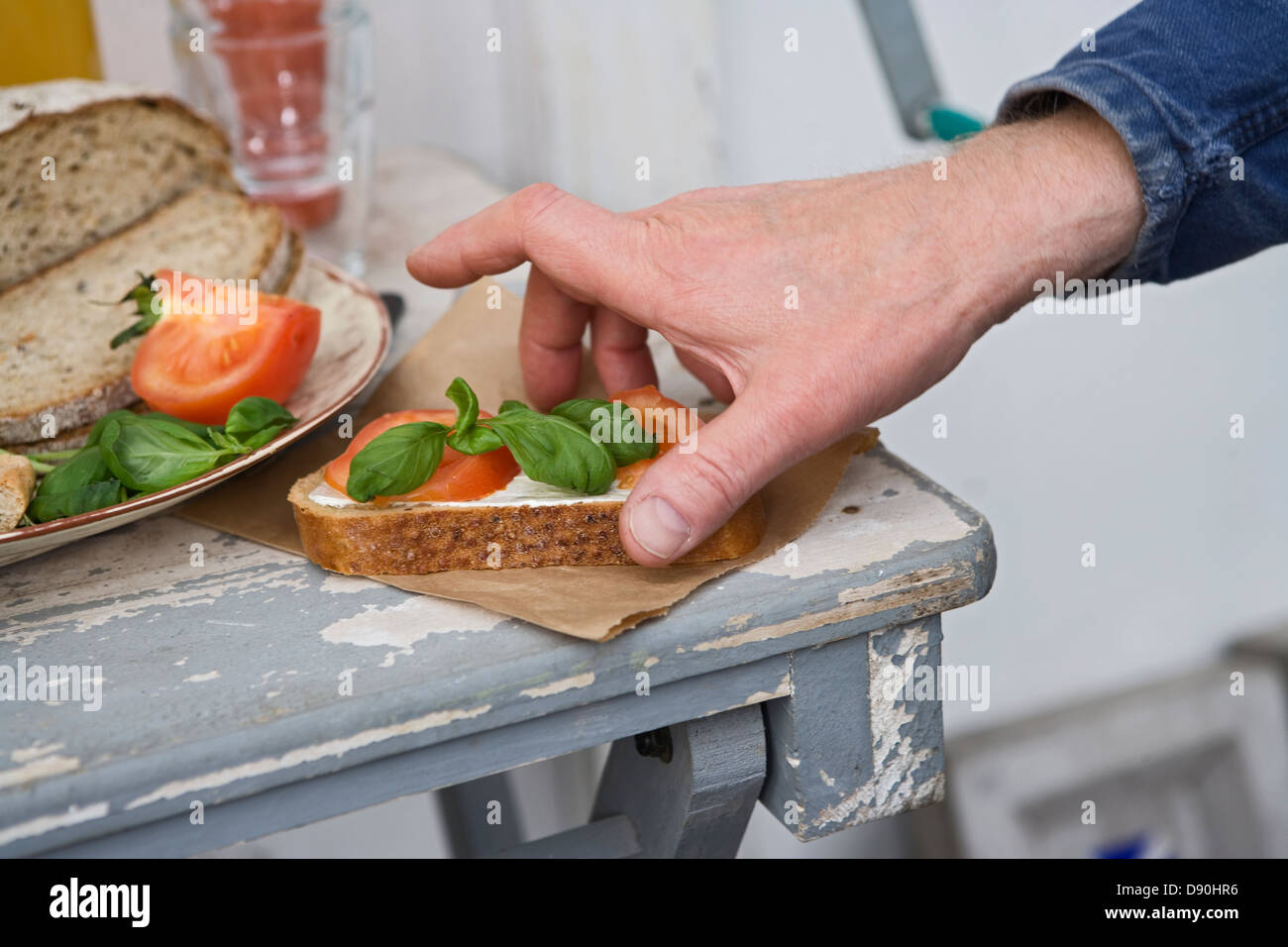 Sandwich with tomato and basil, Sweden Stock Photo - Alamy
