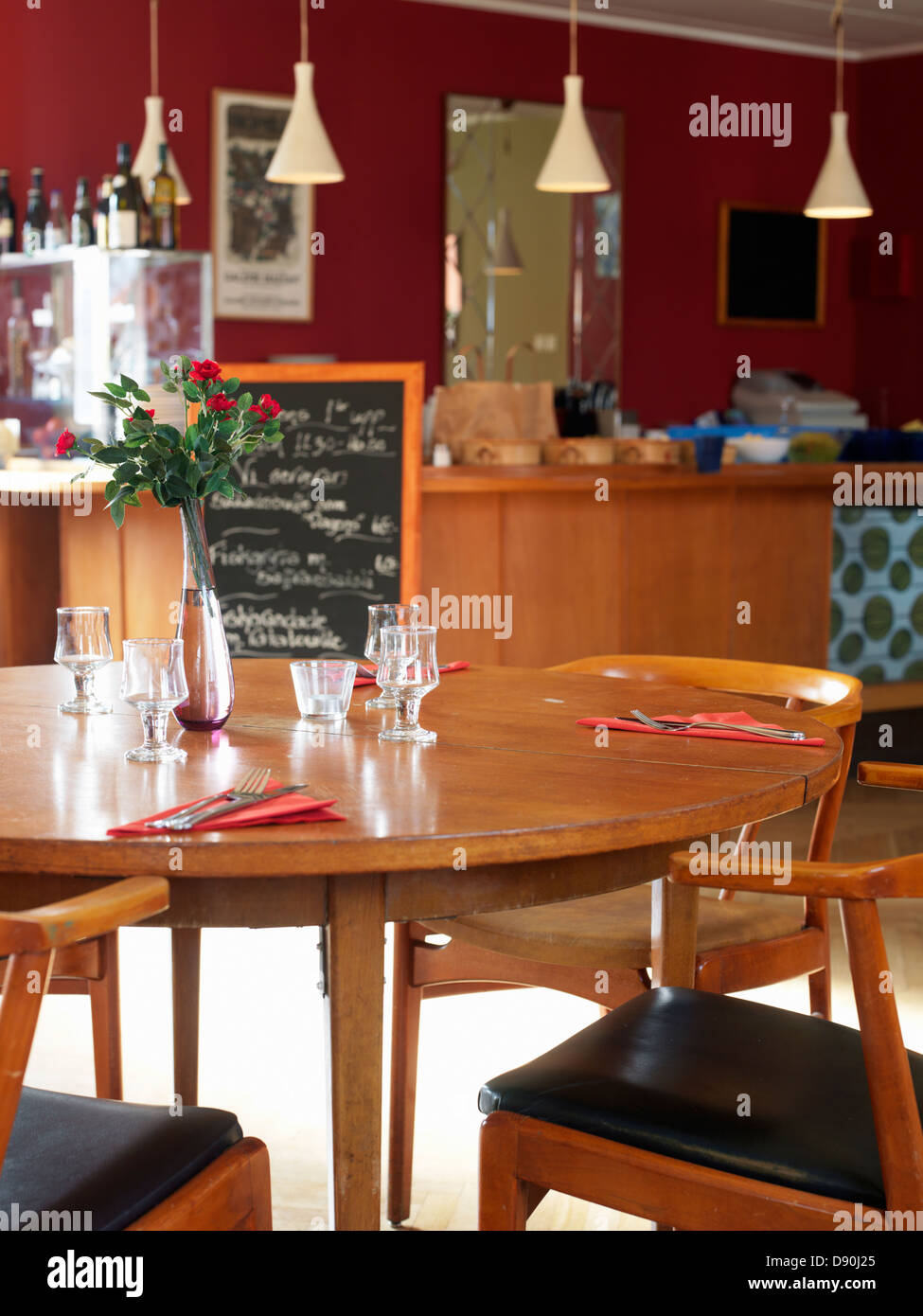 Table laid out in restaurant Stock Photo - Alamy