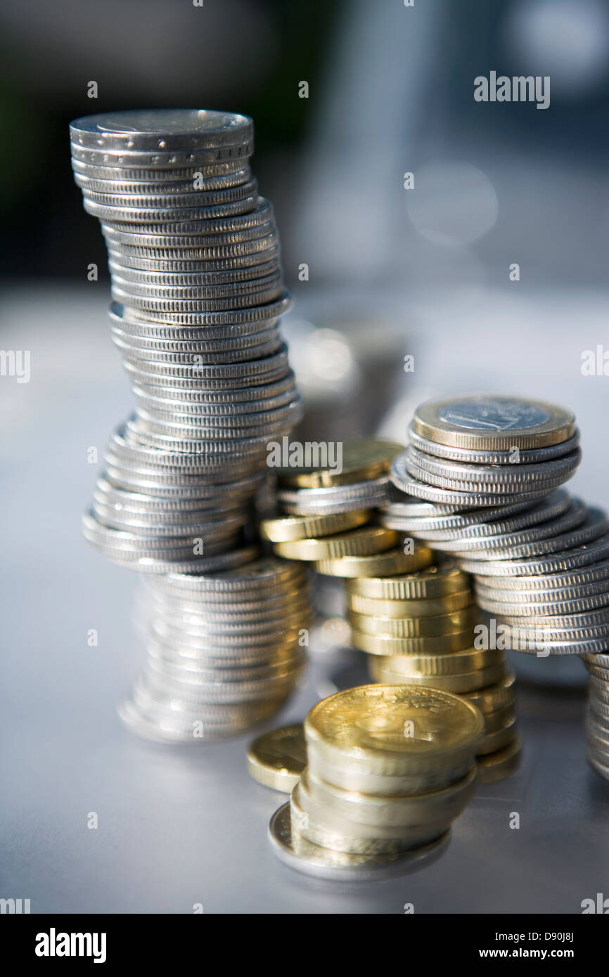 Pile coins hi-res stock photography and images - Alamy