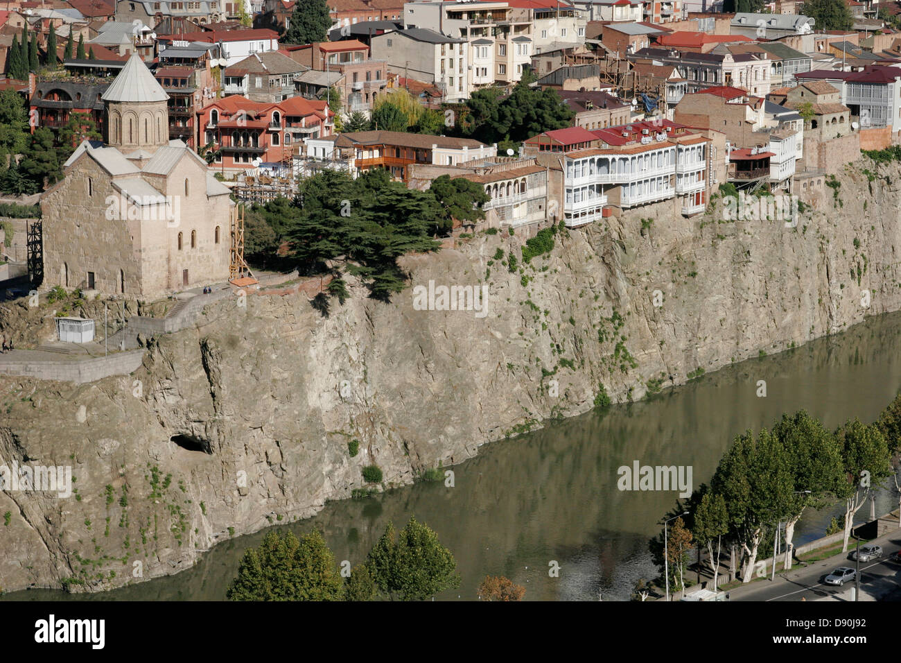 Panoramic view of Metekhi Church sitting on the high cliff above ...
