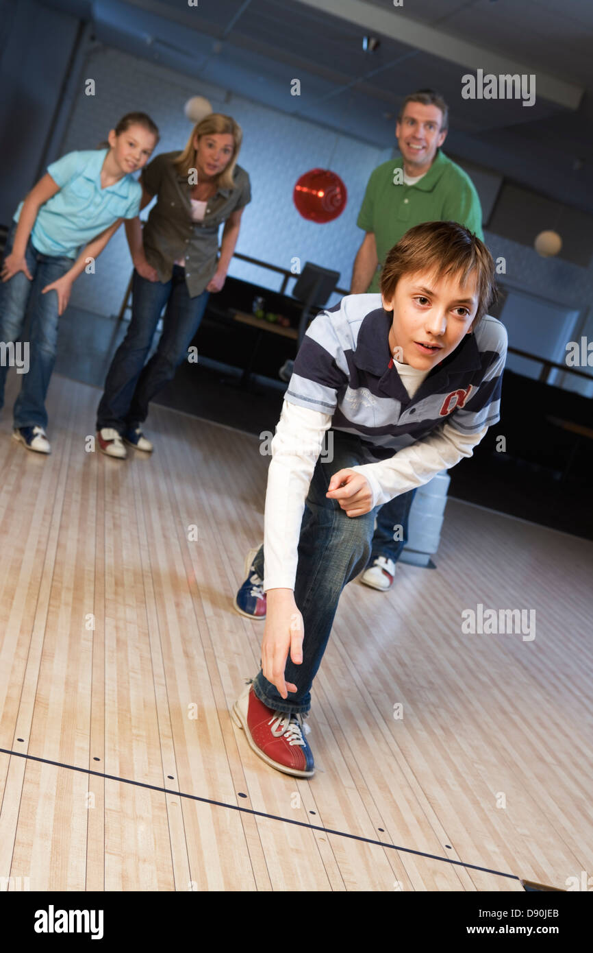 Family in a bowling alley Stock Photo - Alamy