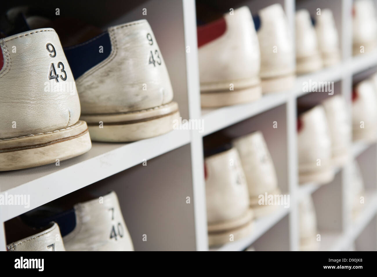 Shoes on shelves in a bowling alley Stock Photo - Alamy