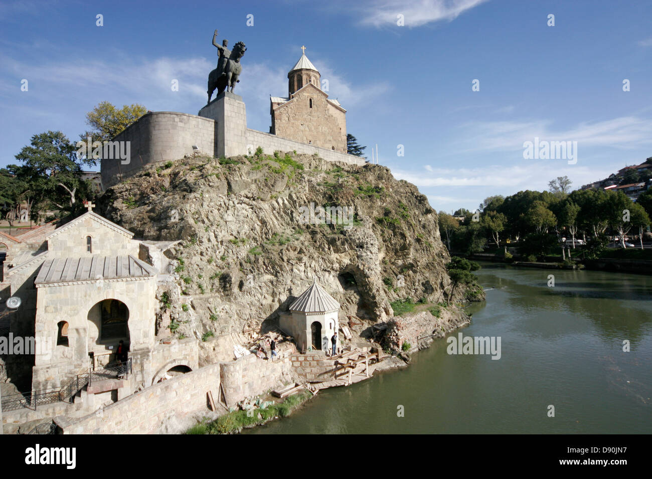 Panoramic view of Metekhi Church sitting on the high cliff above ...