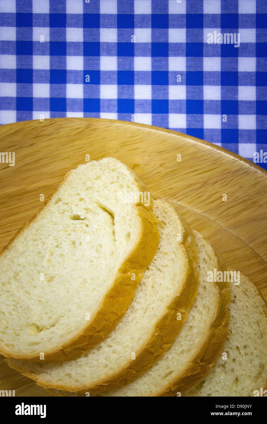 Sliced Bread Slices Stack on wooden board Stock Photo - Alamy