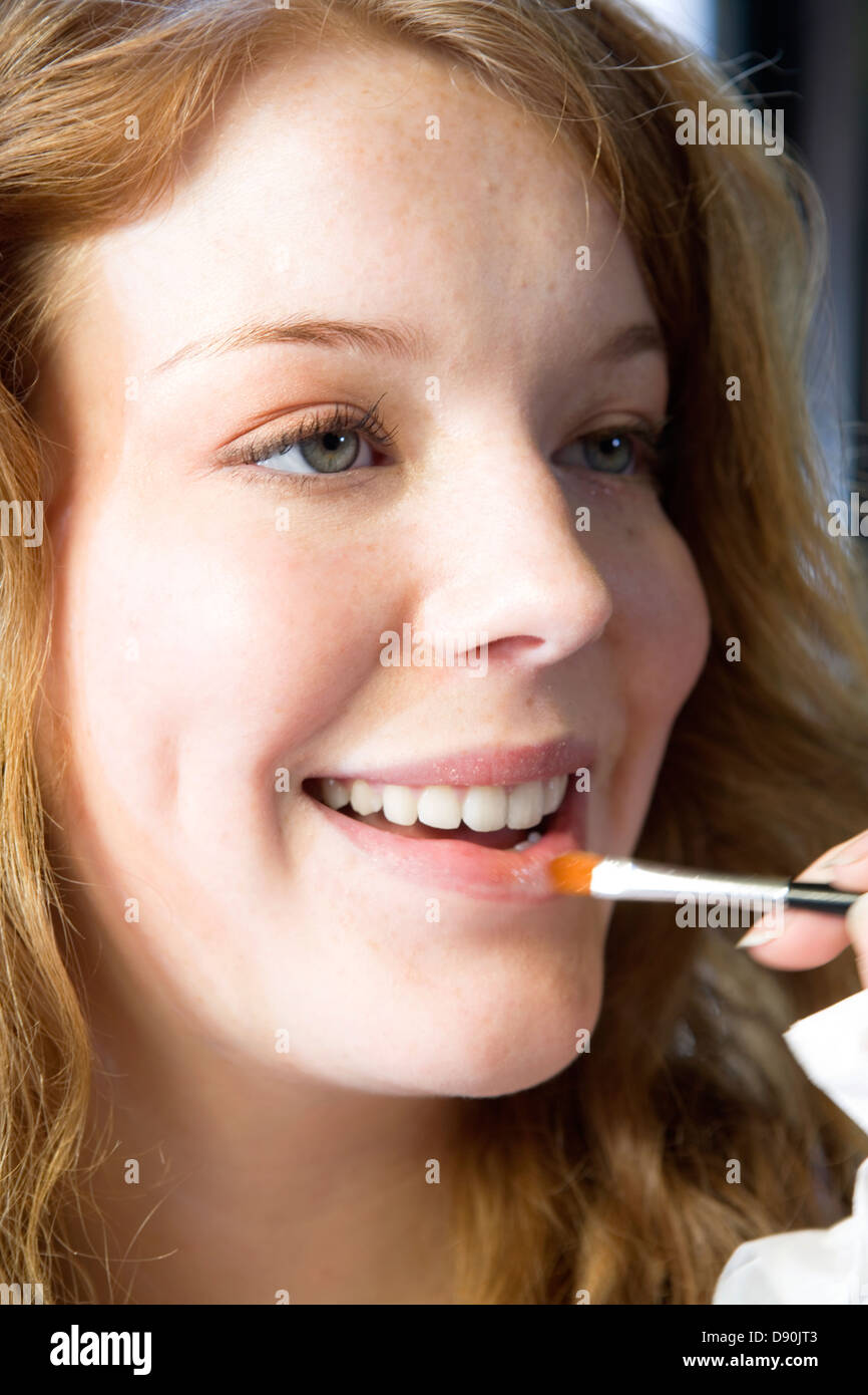 Portrait of a dark-haired, smiling woman Stock Photo - Alamy