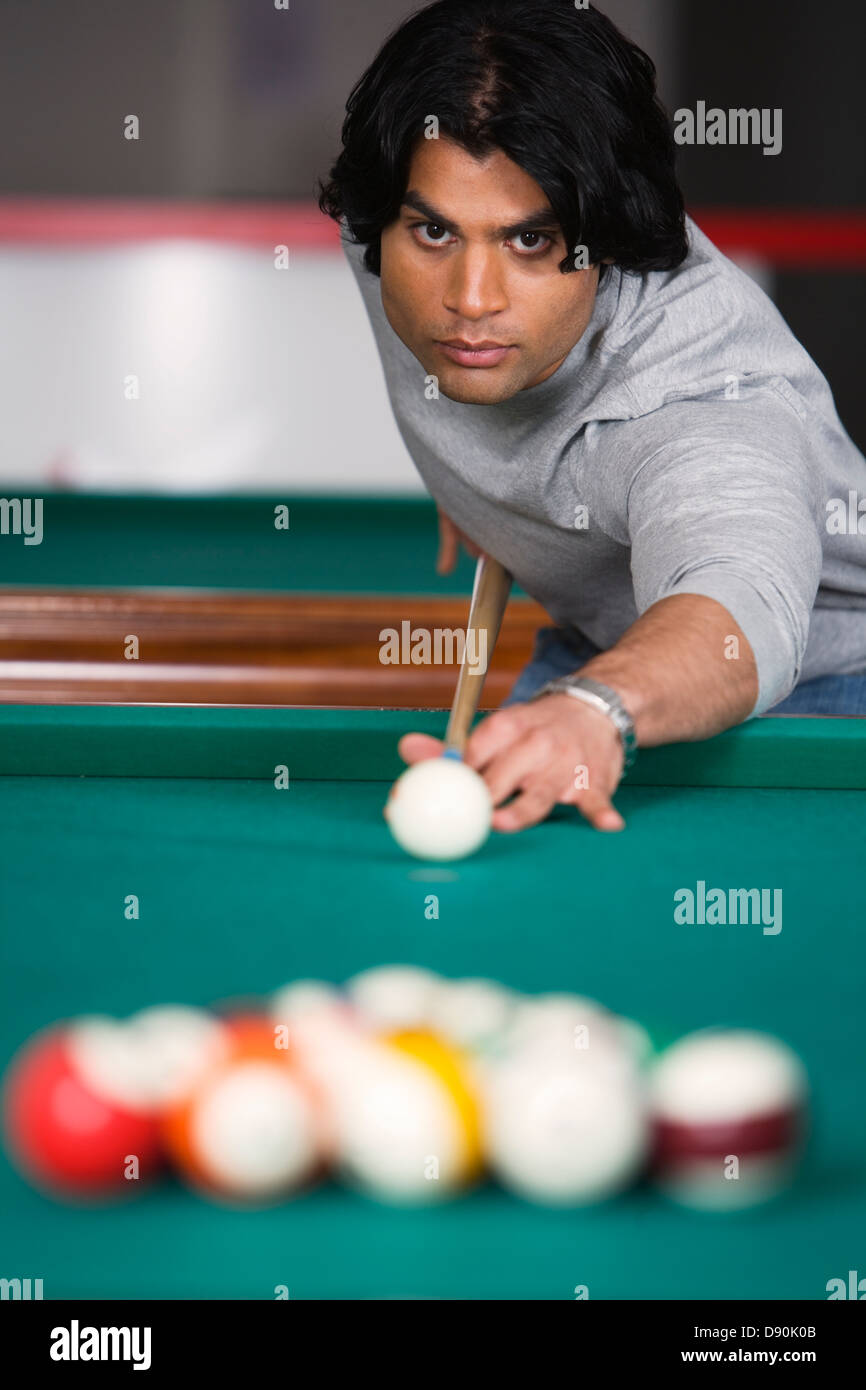 Image of man playing pool hi-res stock photography and images - Alamy