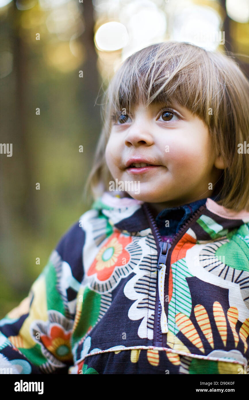 Girl looking up and smiling Stock Photo - Alamy