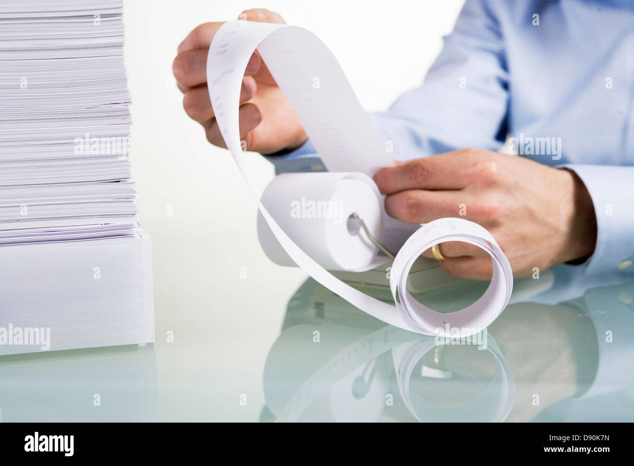 A man doing paper works Stock Photo - Alamy